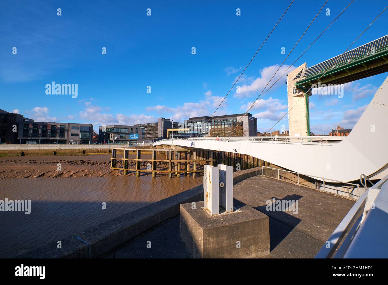 Public footpath across a muddy tidal river Stock Photo - Alamy