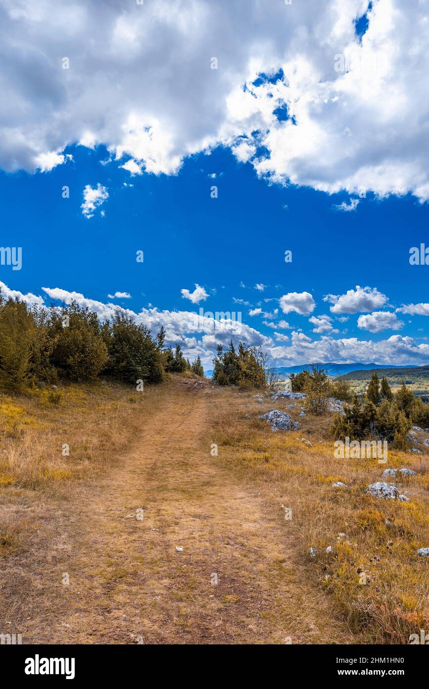 Mountain small path country style with cloudy sky Stock Photo - Alamy