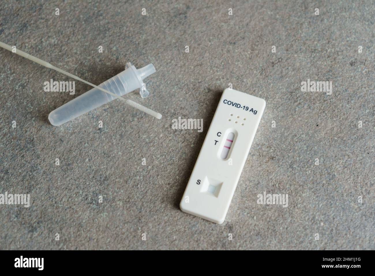 Covid-19 antigen test at home. Positive test result. Self testing rapid ...