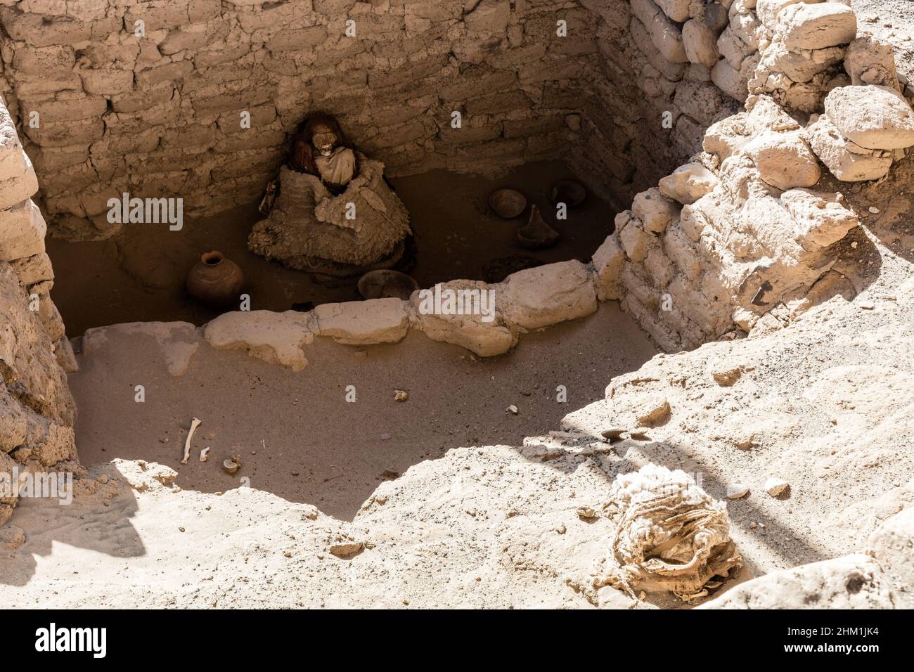 Bones in open inca cemetery in Nazca region , Peru Stock Photo - Alamy