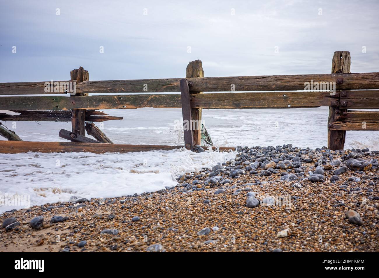 Cromer, Norfolk, UK – February 2022. Wooden groynes to protect the ...