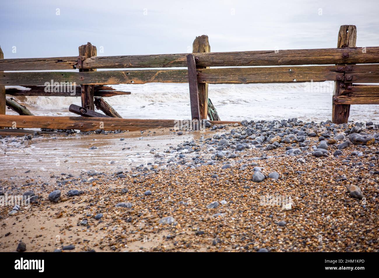 Cromer, Norfolk, UK – February 2022. Wooden groynes to protect the ...