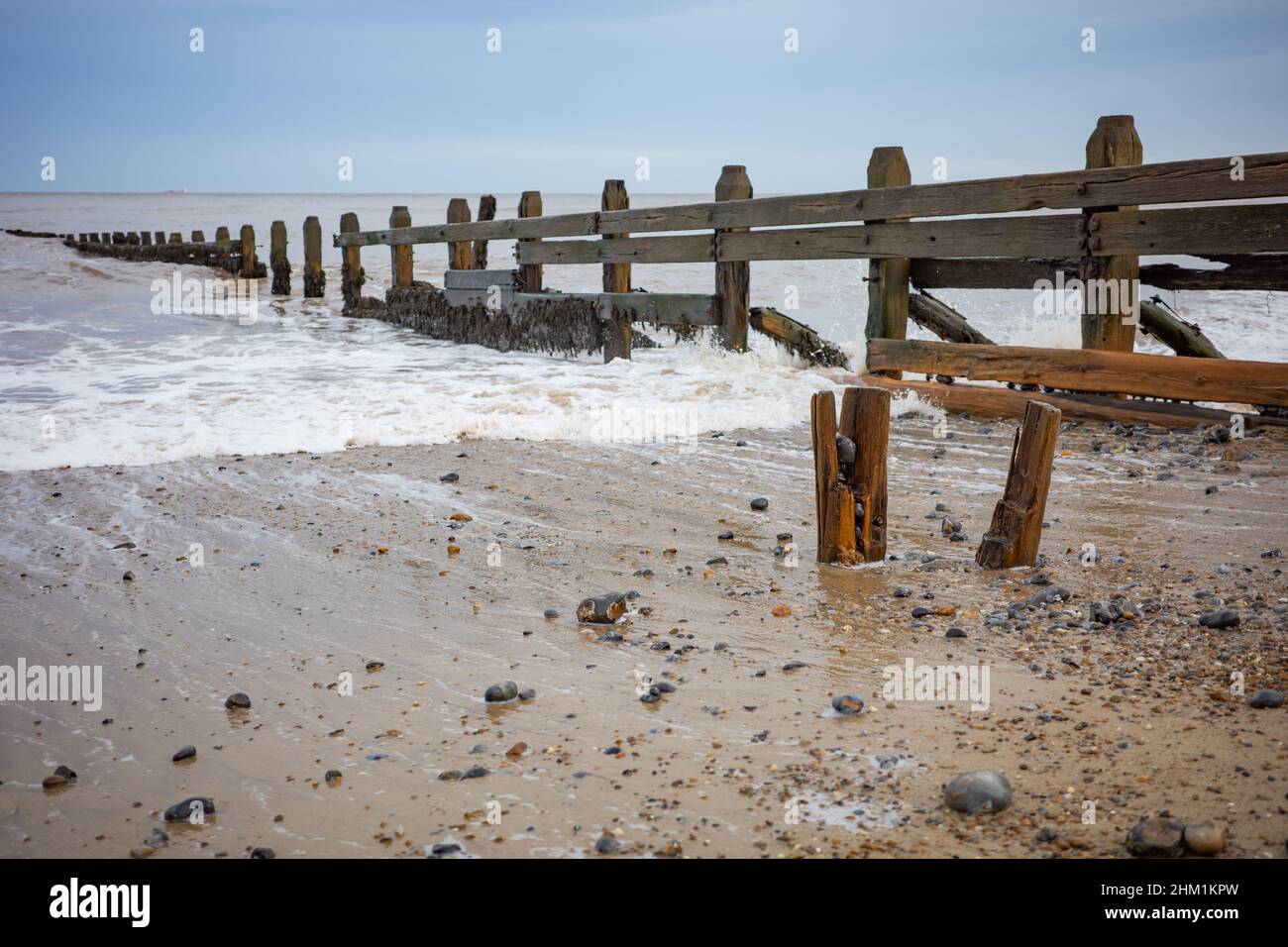 Cromer, Norfolk, UK – February 2022. Wooden groynes to protect the ...