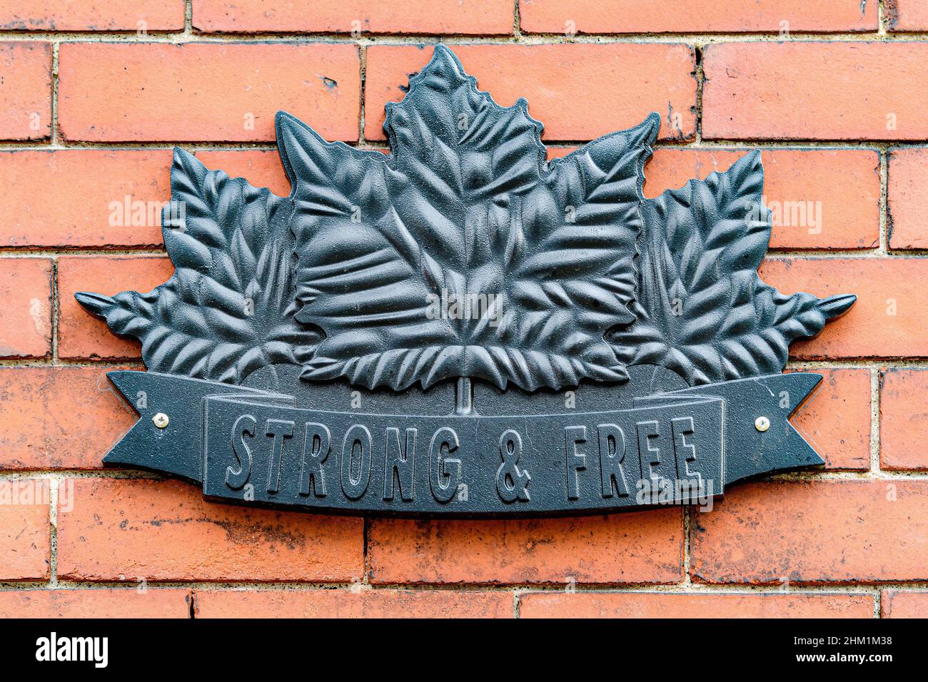 Saint John, NB, Canada - November 26, 2017: A metal logo on the side of ...