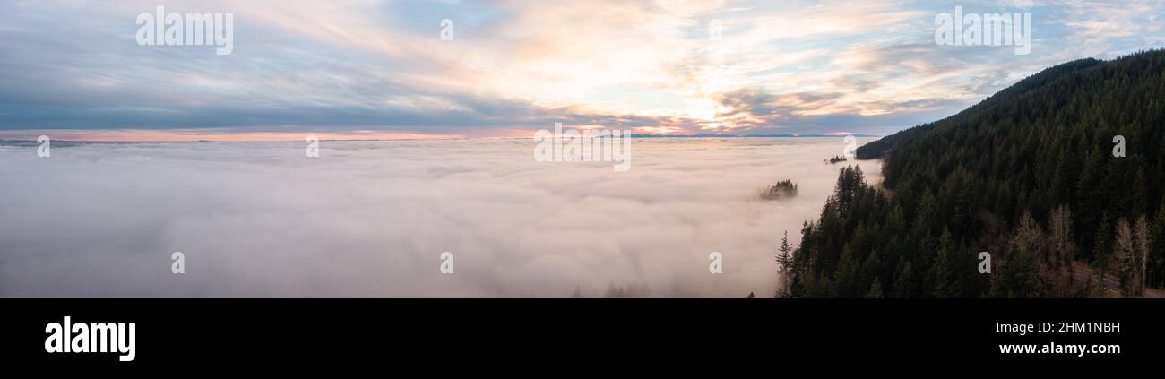 Panoramic View of Canadian Nature Mountain Landscape covered in cloud ...
