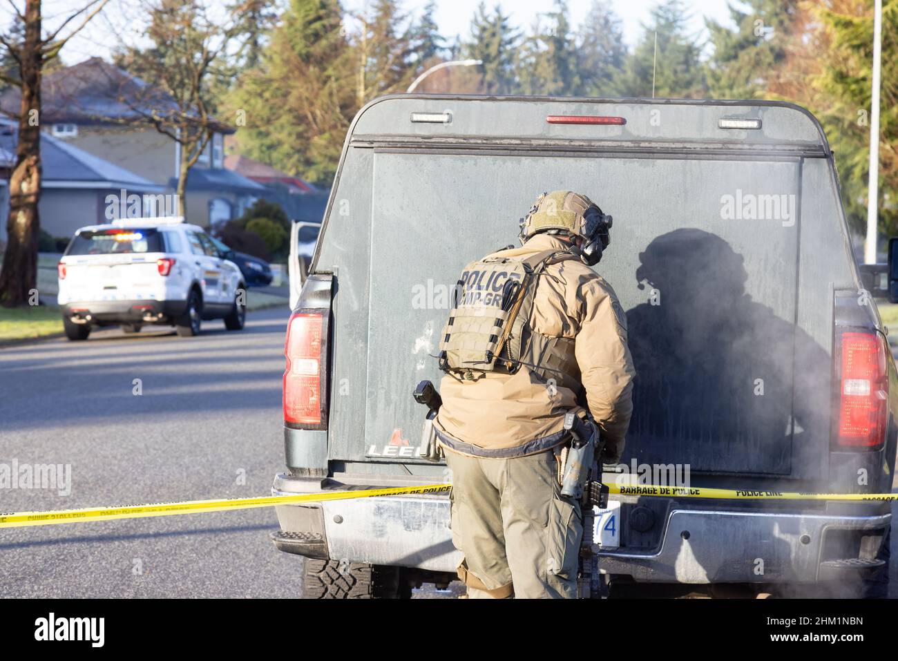 Police and Swat Team are arresting a man for alleged Robery Stock Photo ...