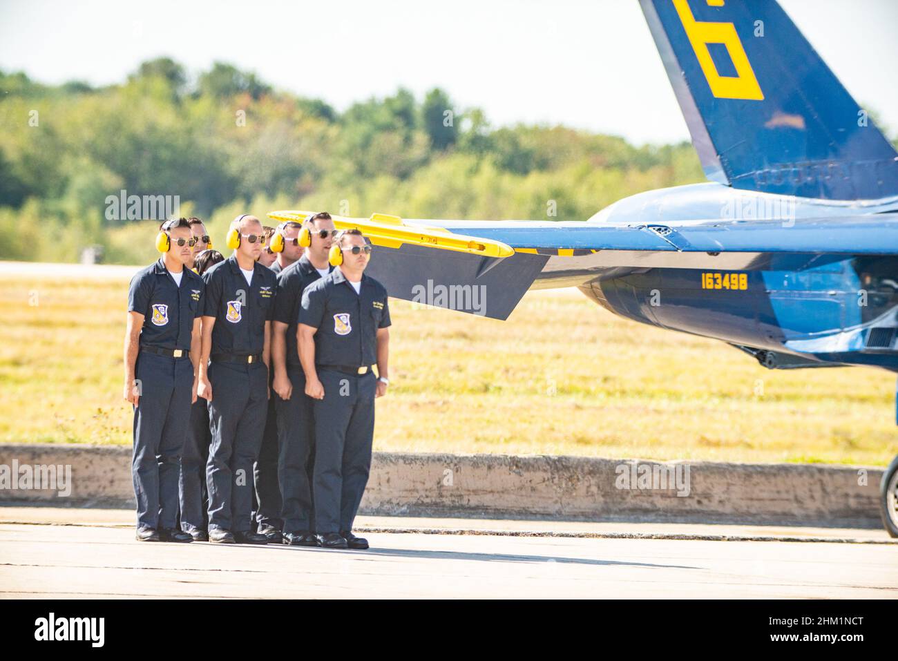 U.S. Navy Blue Angels Flight Demonstration Team. Static ground display and crew members Stock ...