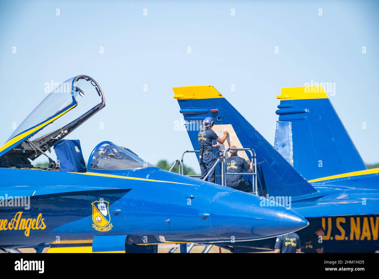 U.S. Navy Blue Angels Flight Demonstration Team. Static ground display and crew members Stock ...