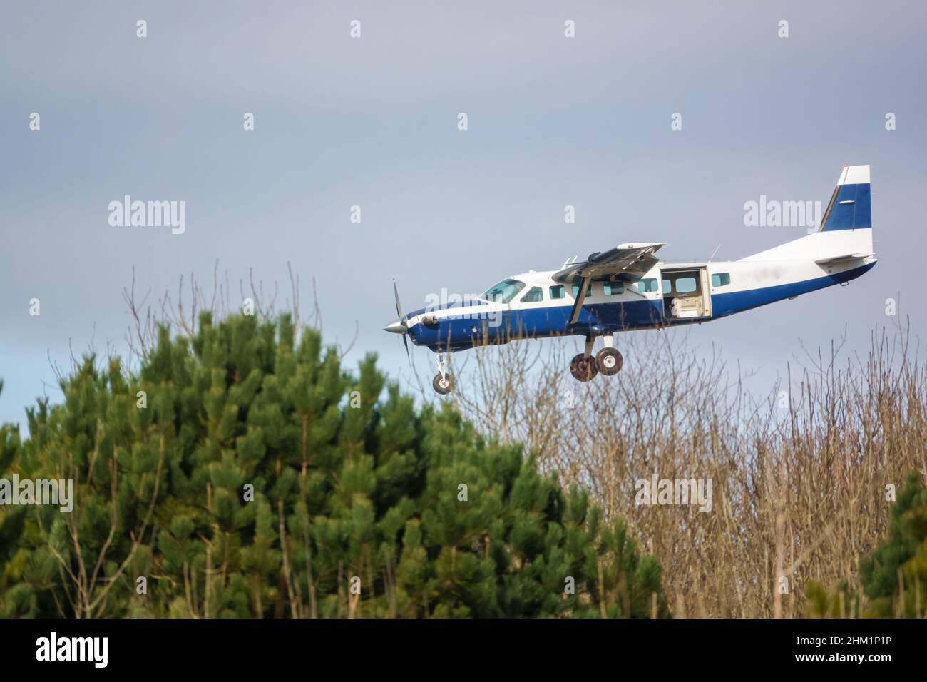 Cessna 208b Grand Caravan G-CPSS on final approach after dropping a ...