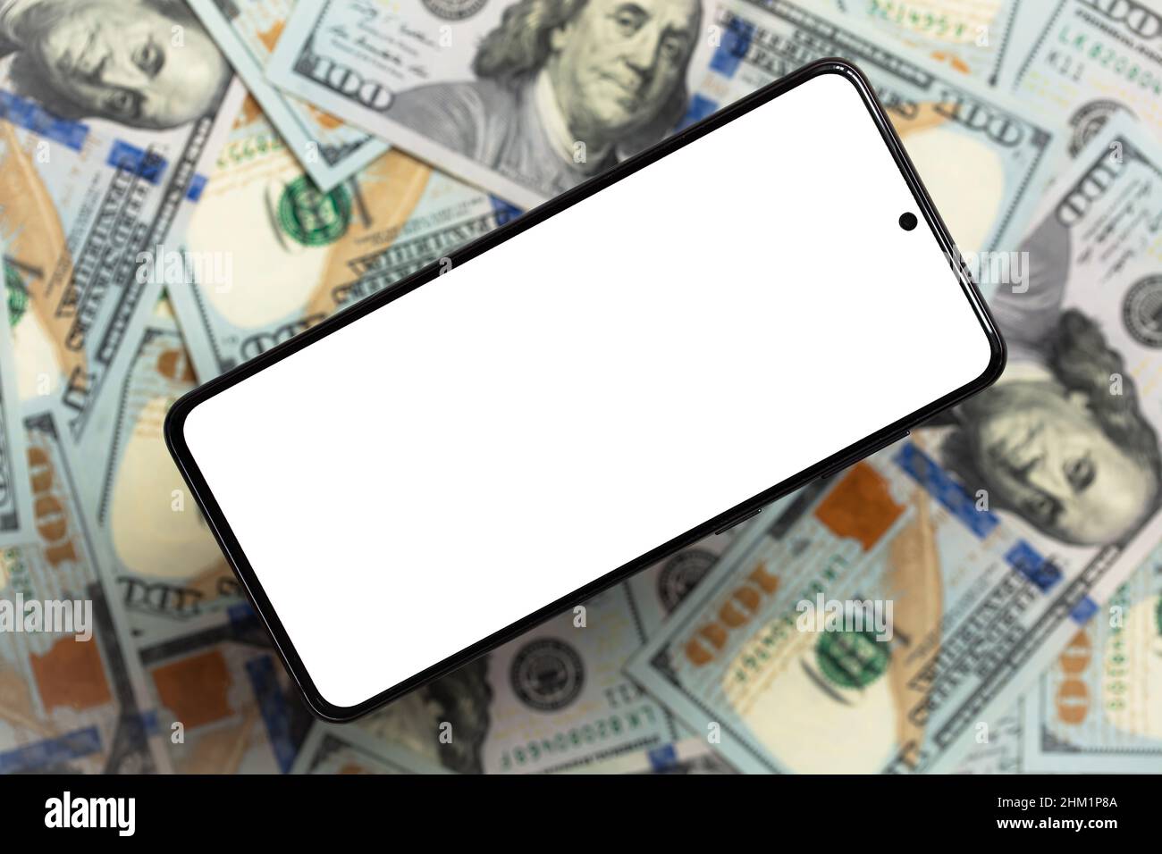 white smartphone screen on US dollar banknotes background for design ...