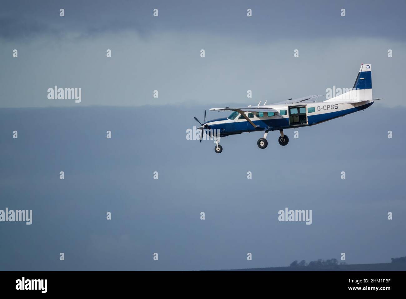 Cessna 208b Grand Caravan G-CPSS on final approach after dropping a ...