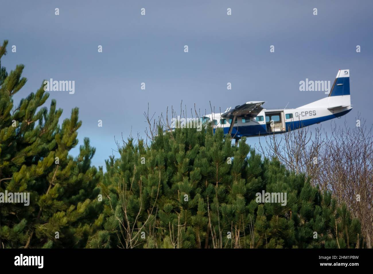 Cessna 208b Grand Caravan G-CPSS on final approach after dropping a ...