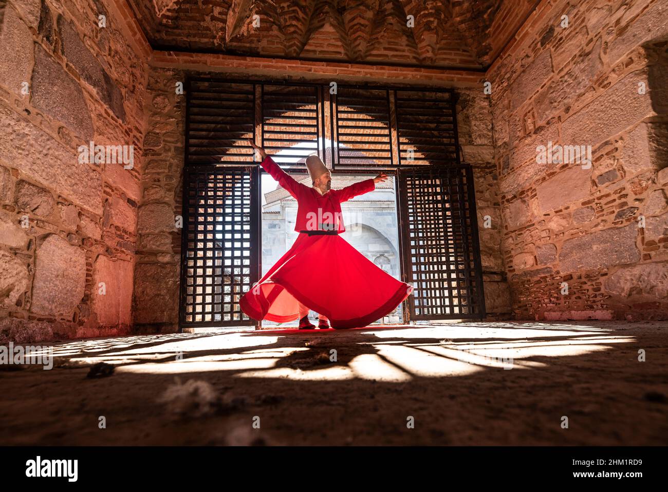 02.04.2022,Soke,Aydin,Turkey,whirling dervish performing in red costume ...