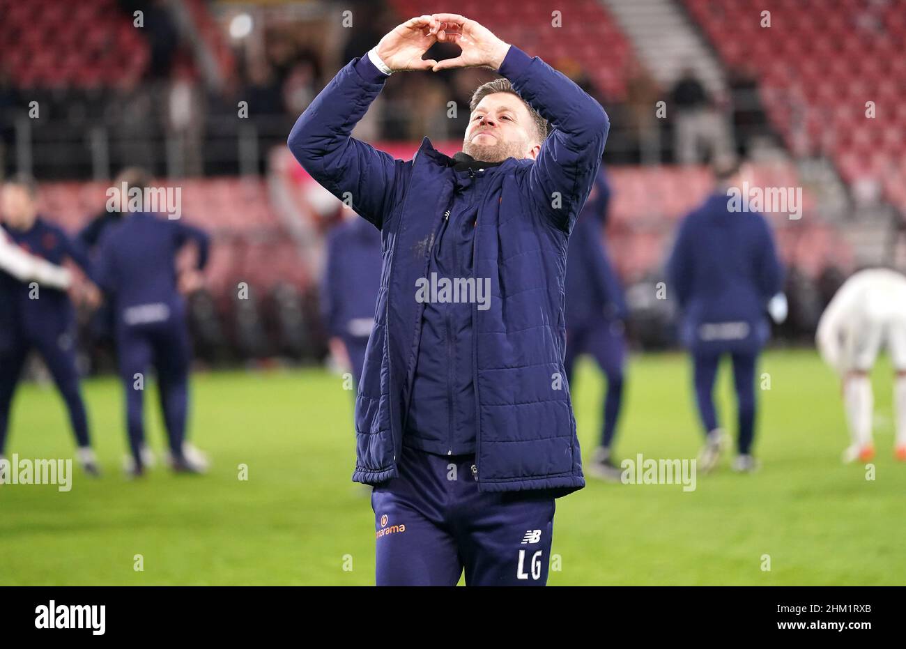 Boreham Wood goalkeeper Luke Garrard celebrates with the fans after the ...