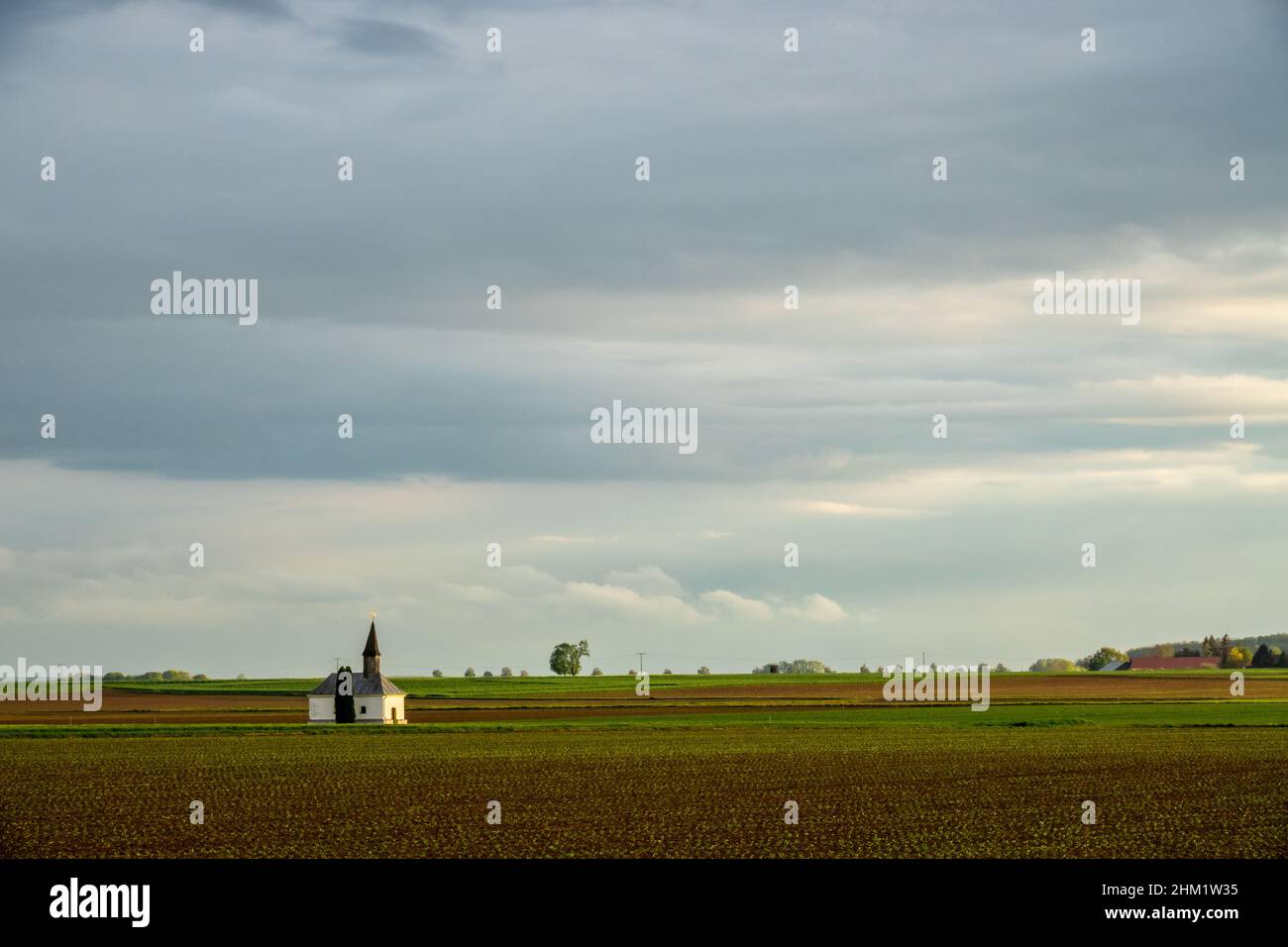 Old white rural church in a farm field under the blue sky Stock Photo ...