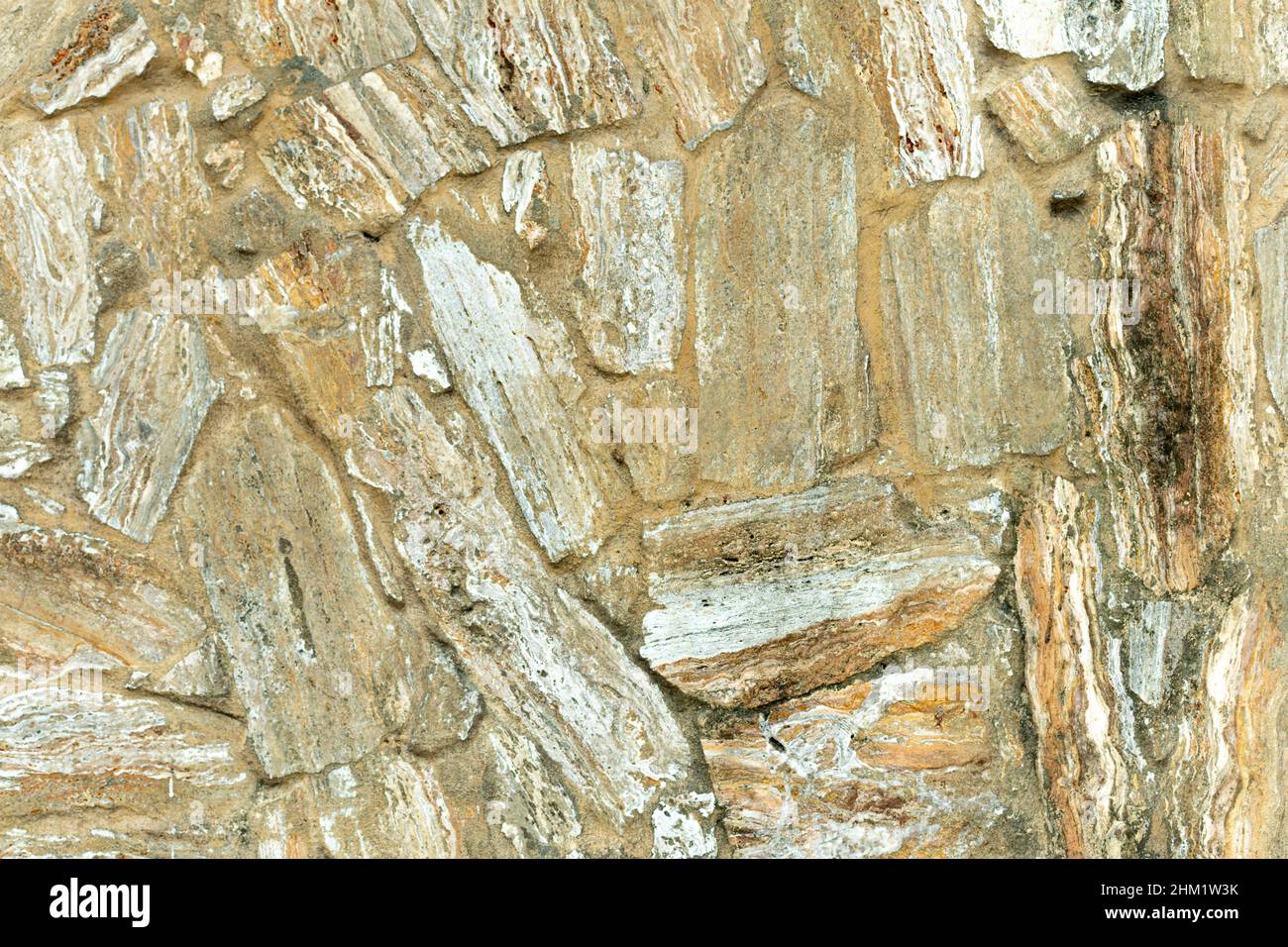 Stone wall texture of irregular shapes Stock Photo - Alamy
