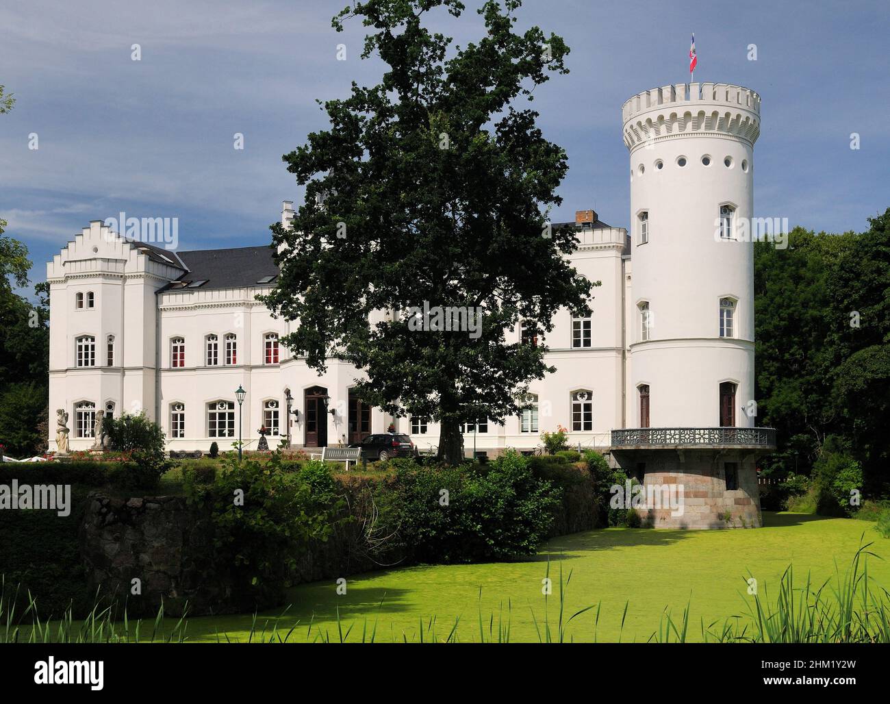 Beautiful White Castle With Green Moat In Schlemmin Germany On A ...