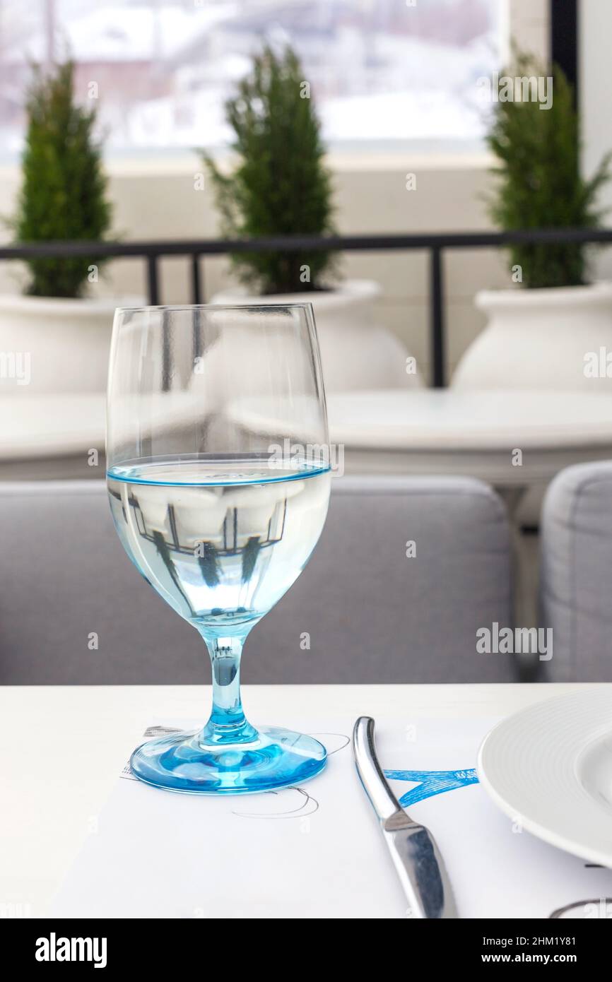 glass of water on a table in a restaurant Stock Photo - Alamy
