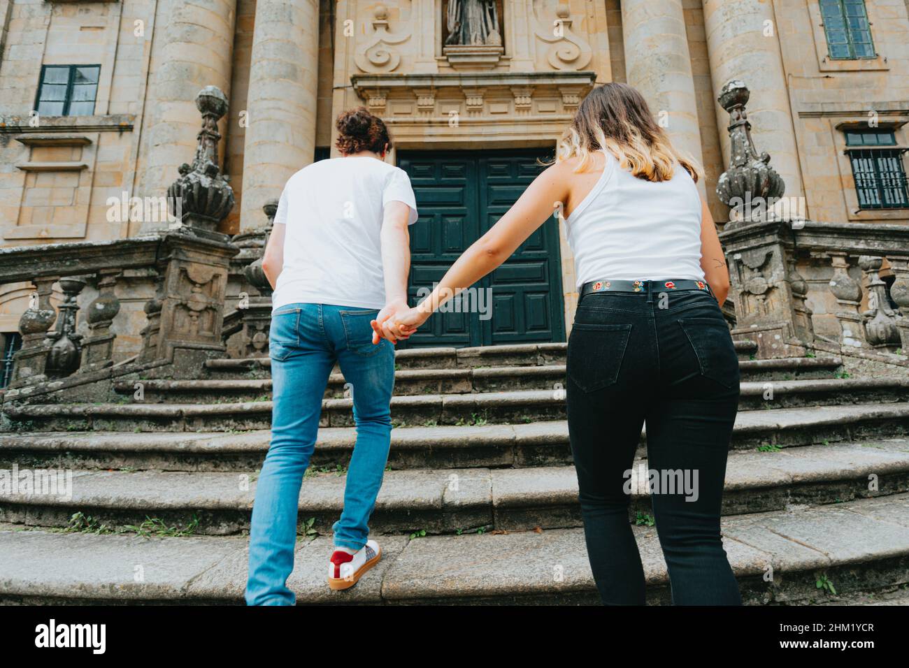 Holding hands walking up stairs hi-res stock photography and images - Alamy