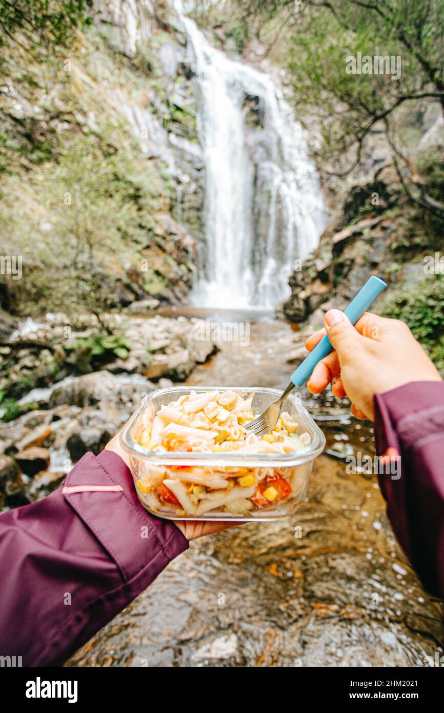 Female hiker in front of waterfall hi-res stock photography and images ...