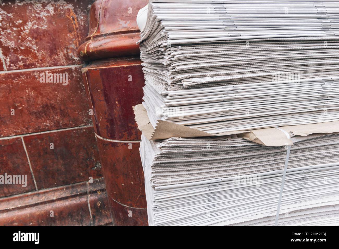 newspaper stack on street Stock Photo - Alamy