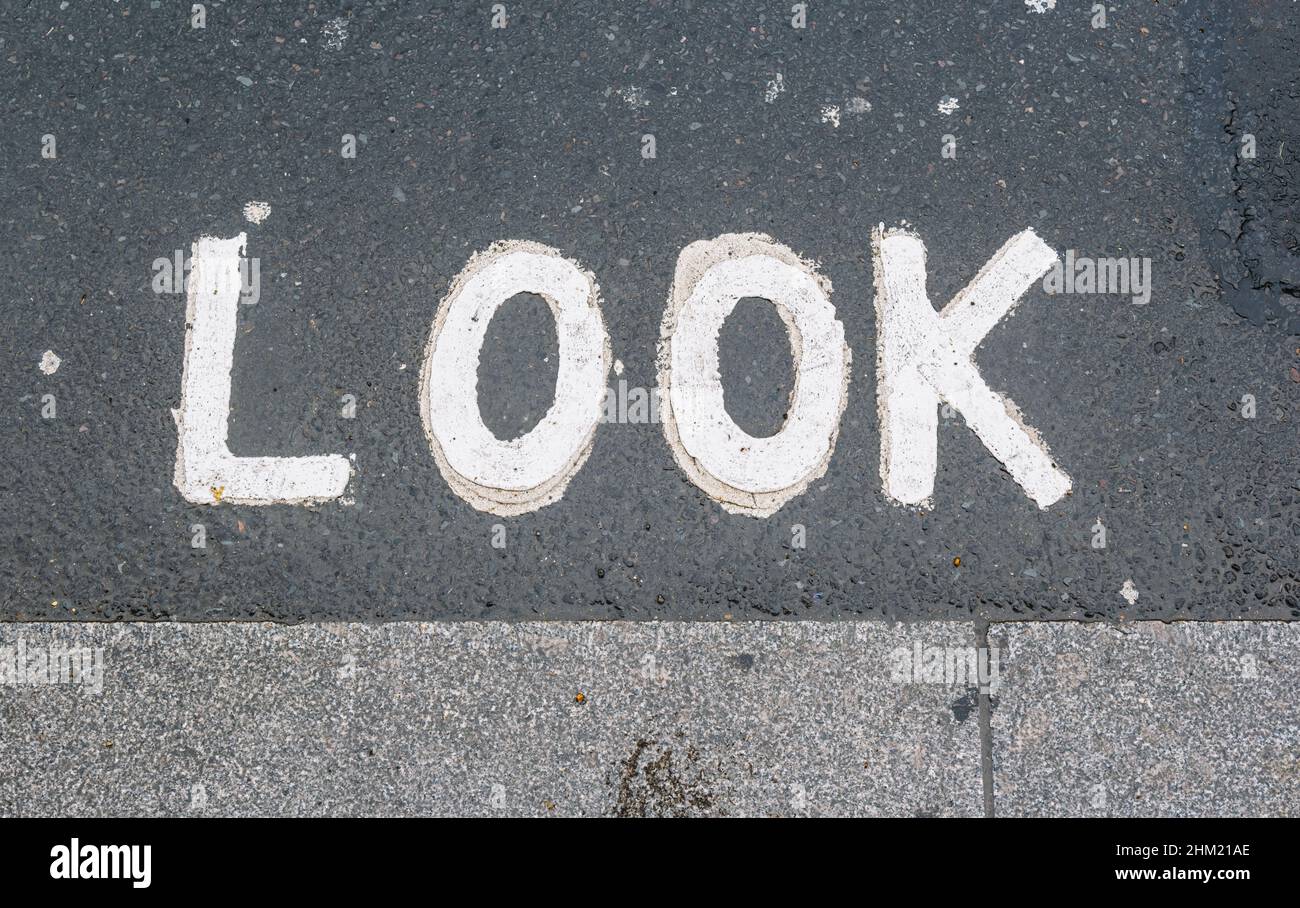 Look sign in a London street Stock Photo - Alamy