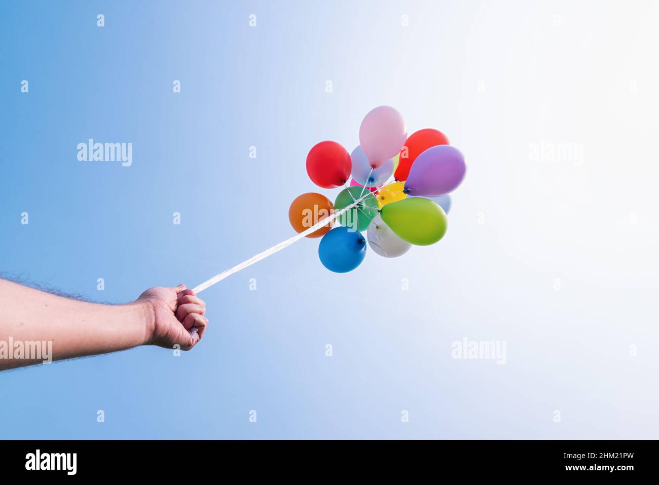 Colorful balloons on sky hi-res stock photography and images - Alamy