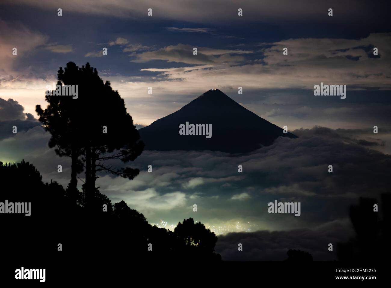 Agua Volcano (Volcán de Agua) with moon rise light Stock Photo - Alamy