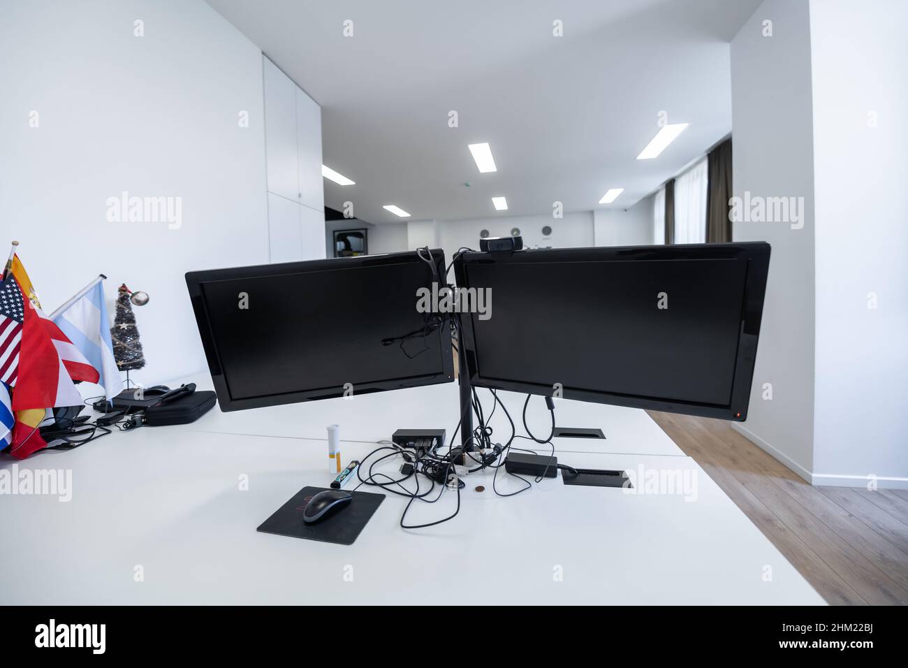 Empty startup office interior with modern computers and dual screen ...