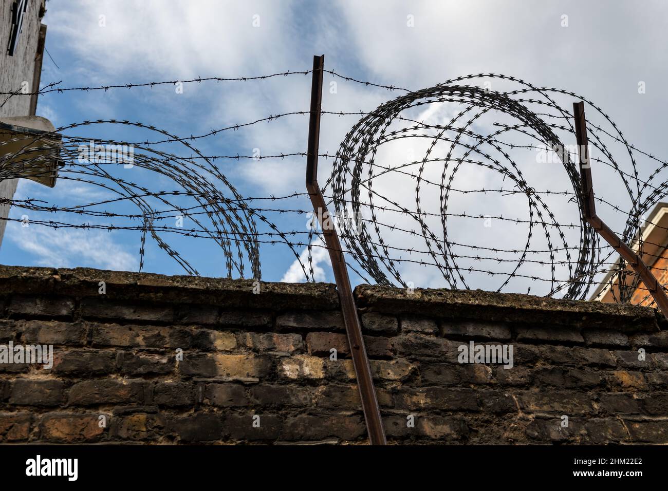 Barbed wire on perimeter hi-res stock photography and images - Alamy