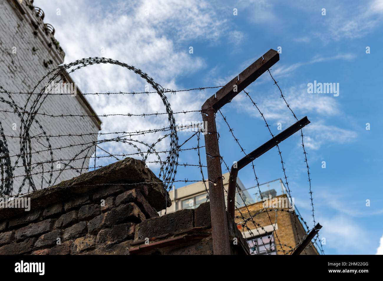 Barbed wire on perimeter hi-res stock photography and images - Alamy