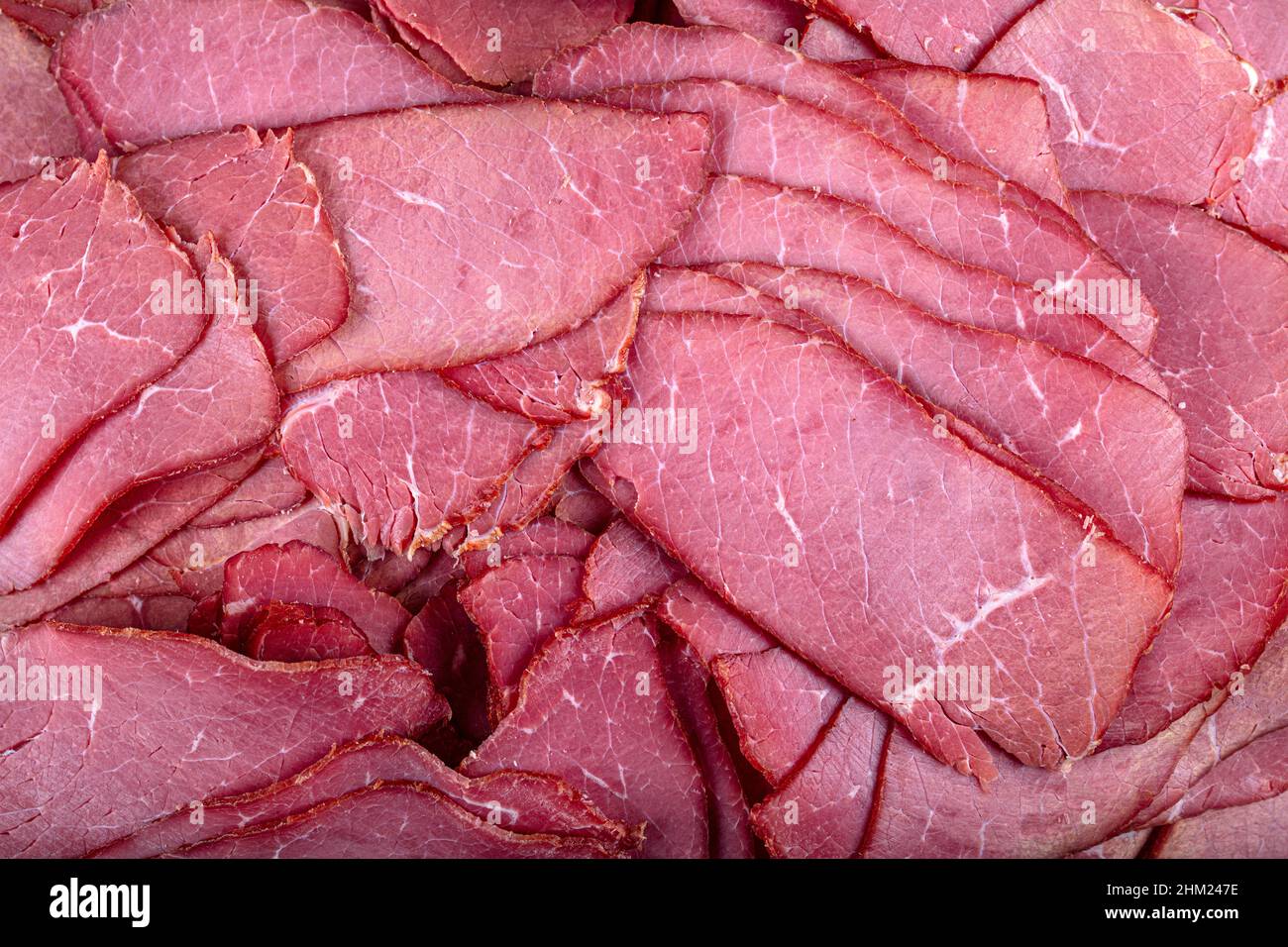 Dried Processed Beef Jerky against a background. Background texture of ...
