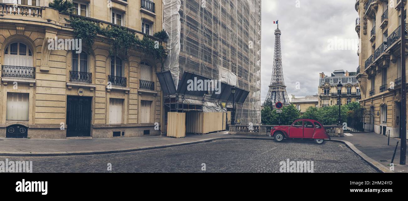 small street in paris with view on the famous eifel tower - panroama ...