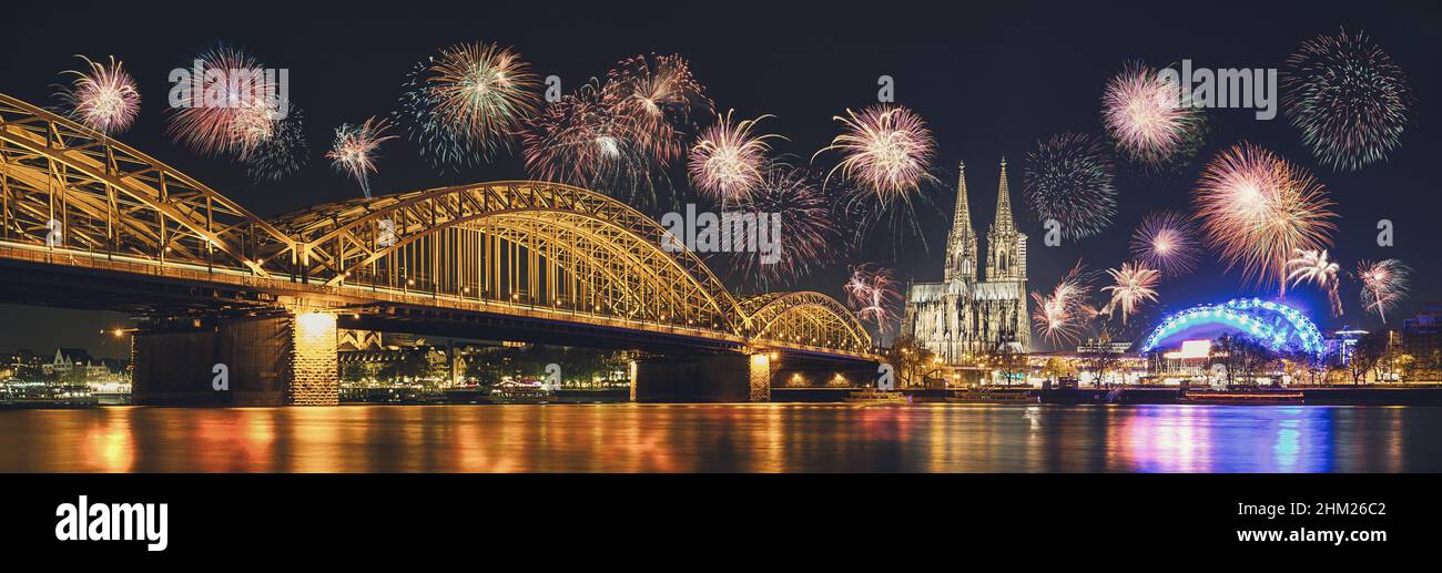 Cologne Cathedral and Hohenzollern Bridge with Fireworks on New Year ...