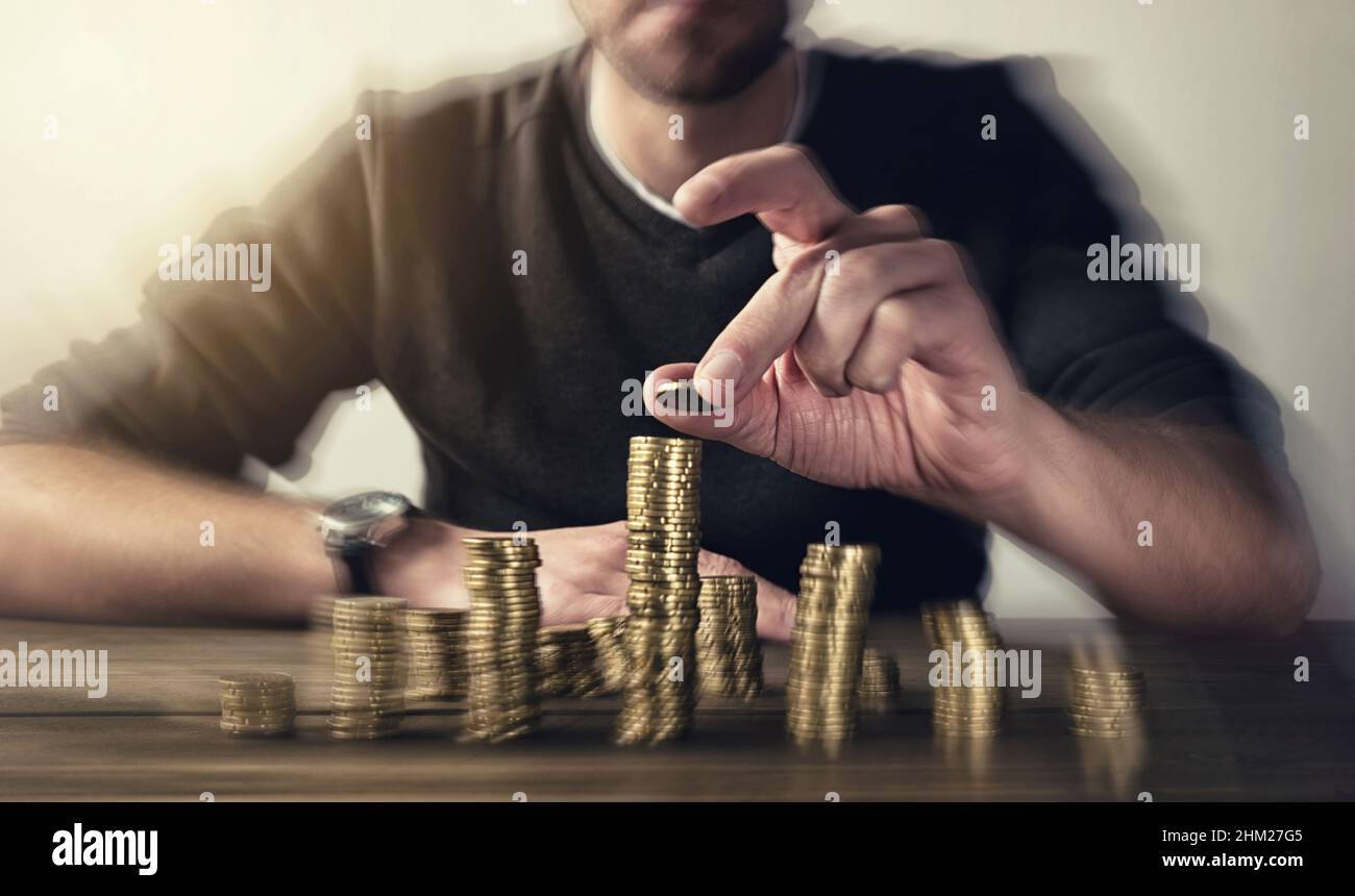 Man safe golden coins hi-res stock photography and images - Alamy