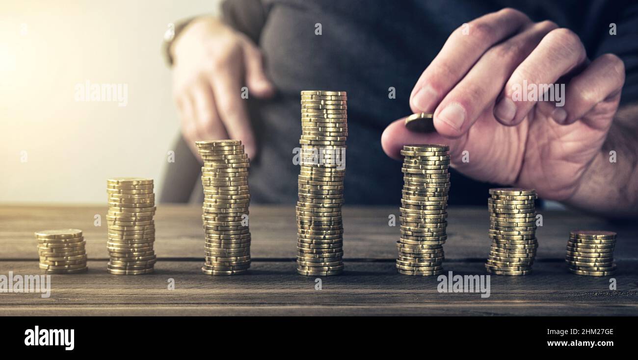 Bank counting stacks of money hi-res stock photography and images - Alamy