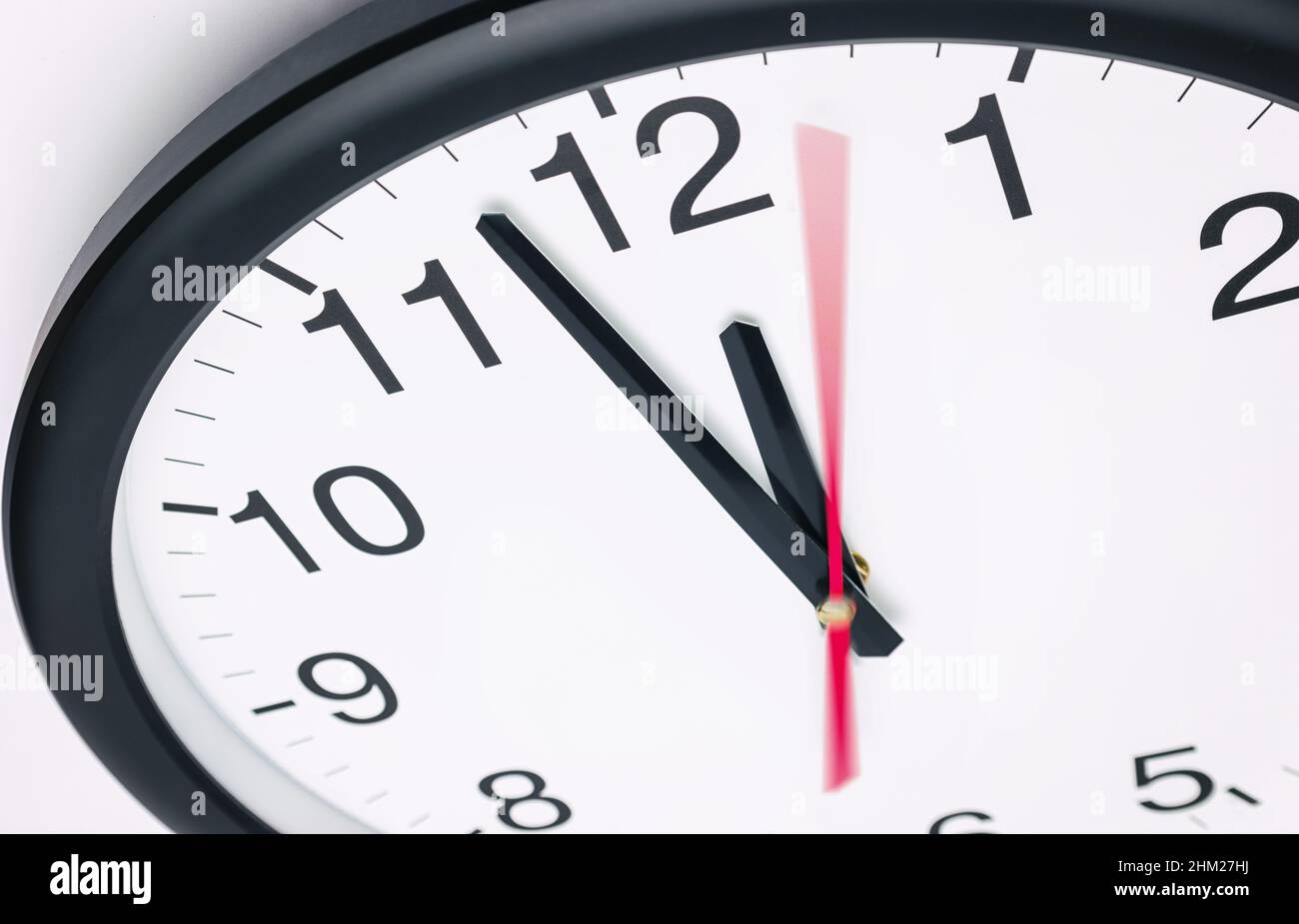 5 to 12 clock time concept Stock Photo - Alamy