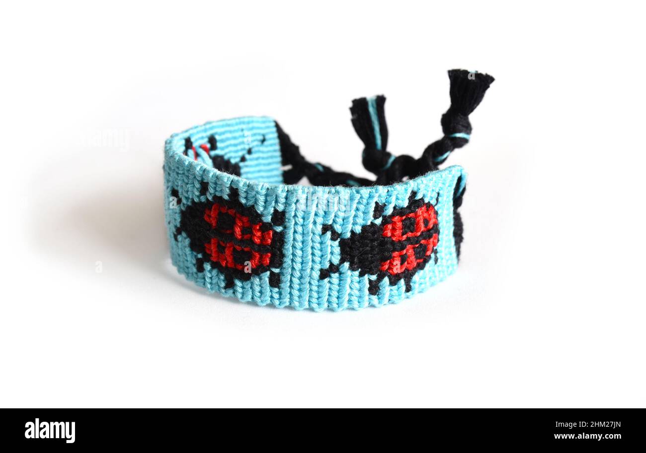 Blue woven DIY friendship bracelet with alpha pattern Ladybug handmade ...