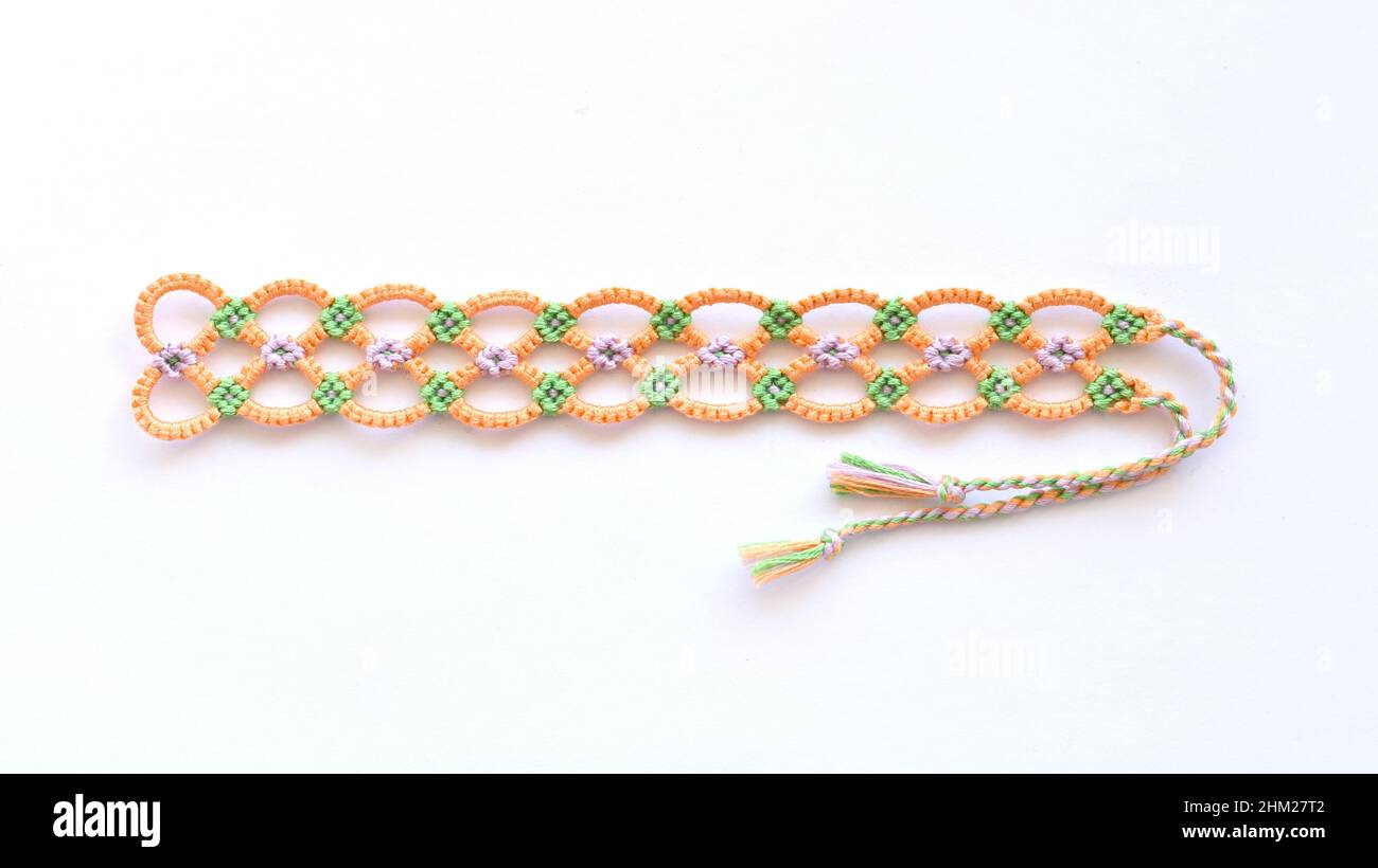 Woven DIY friendship bracelet handmade of embroidery bright thread with ...