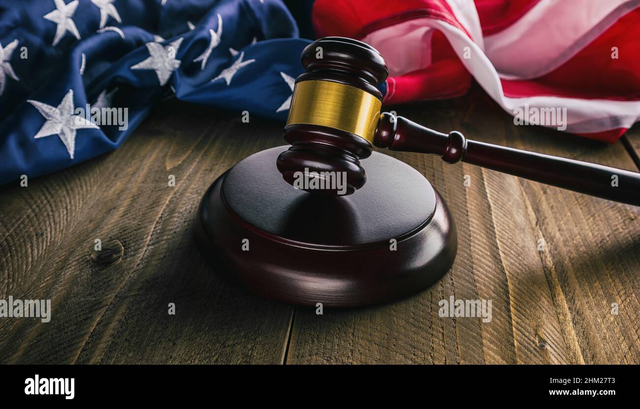 judges wooden gavel with USA flag - law concept image Stock Photo - Alamy