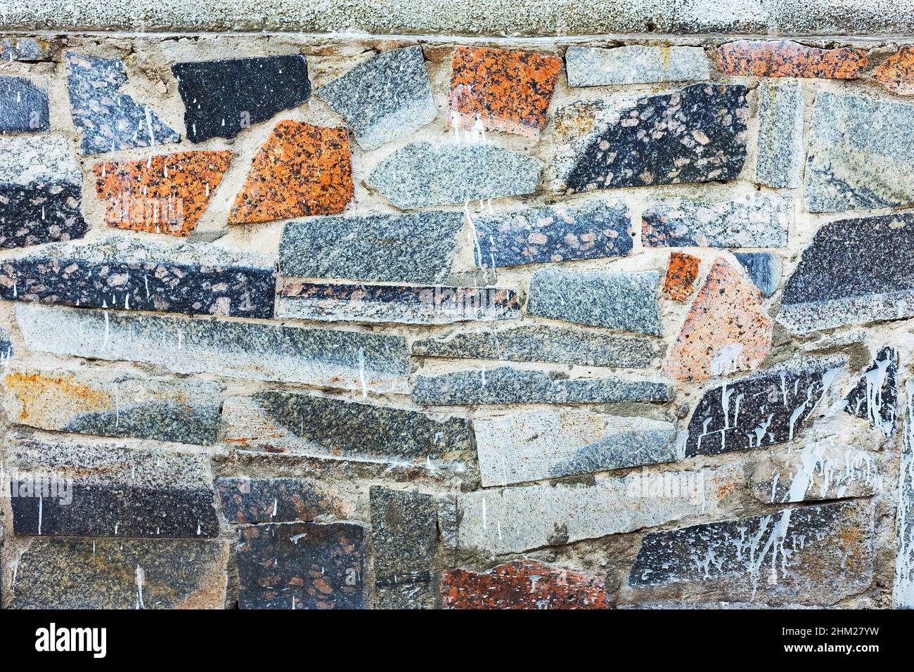 Abstract background of the old wall of black natural stone with cracks ...