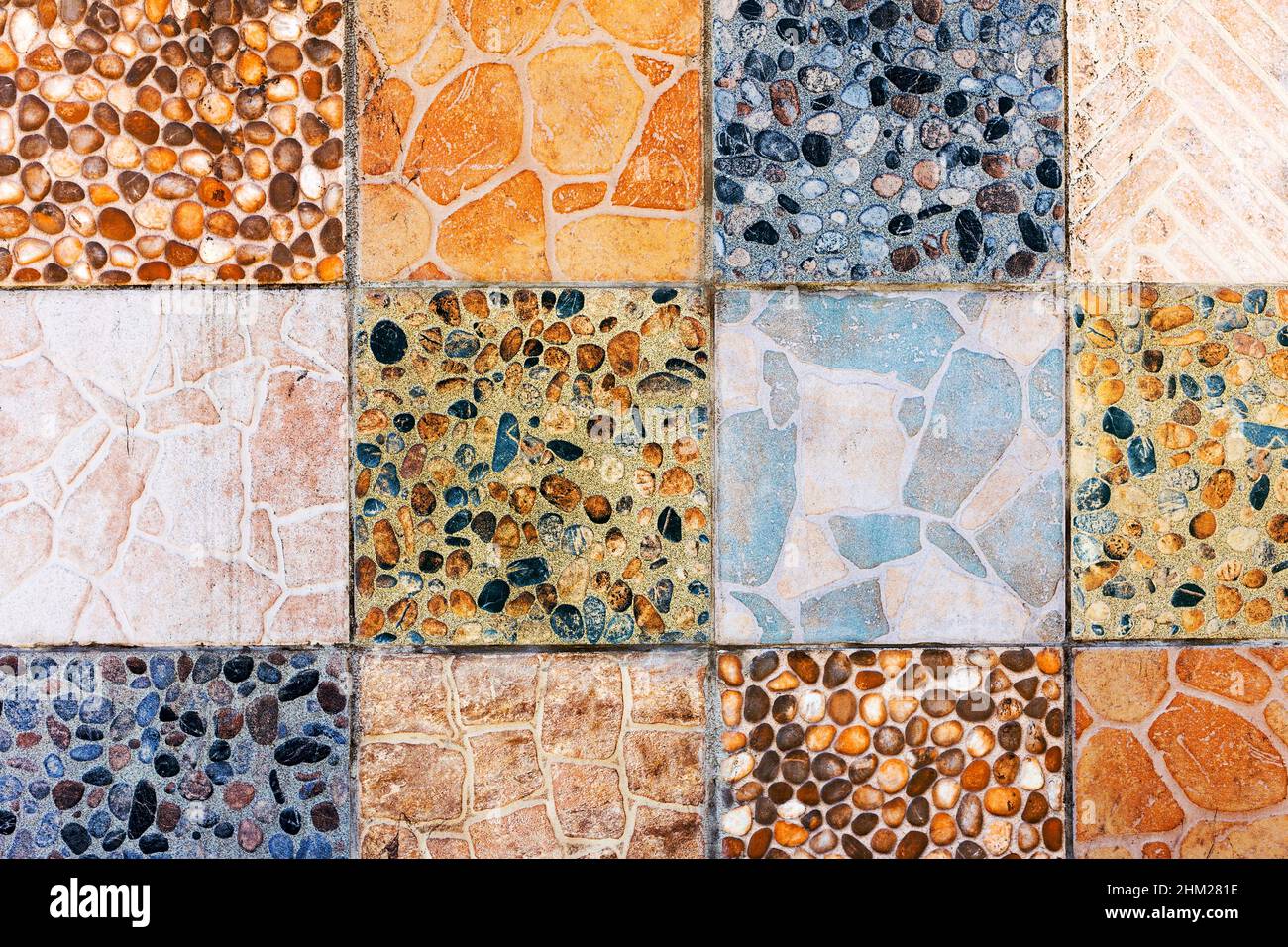 Abstract authentic background of the old wall is lined with slabs of ...