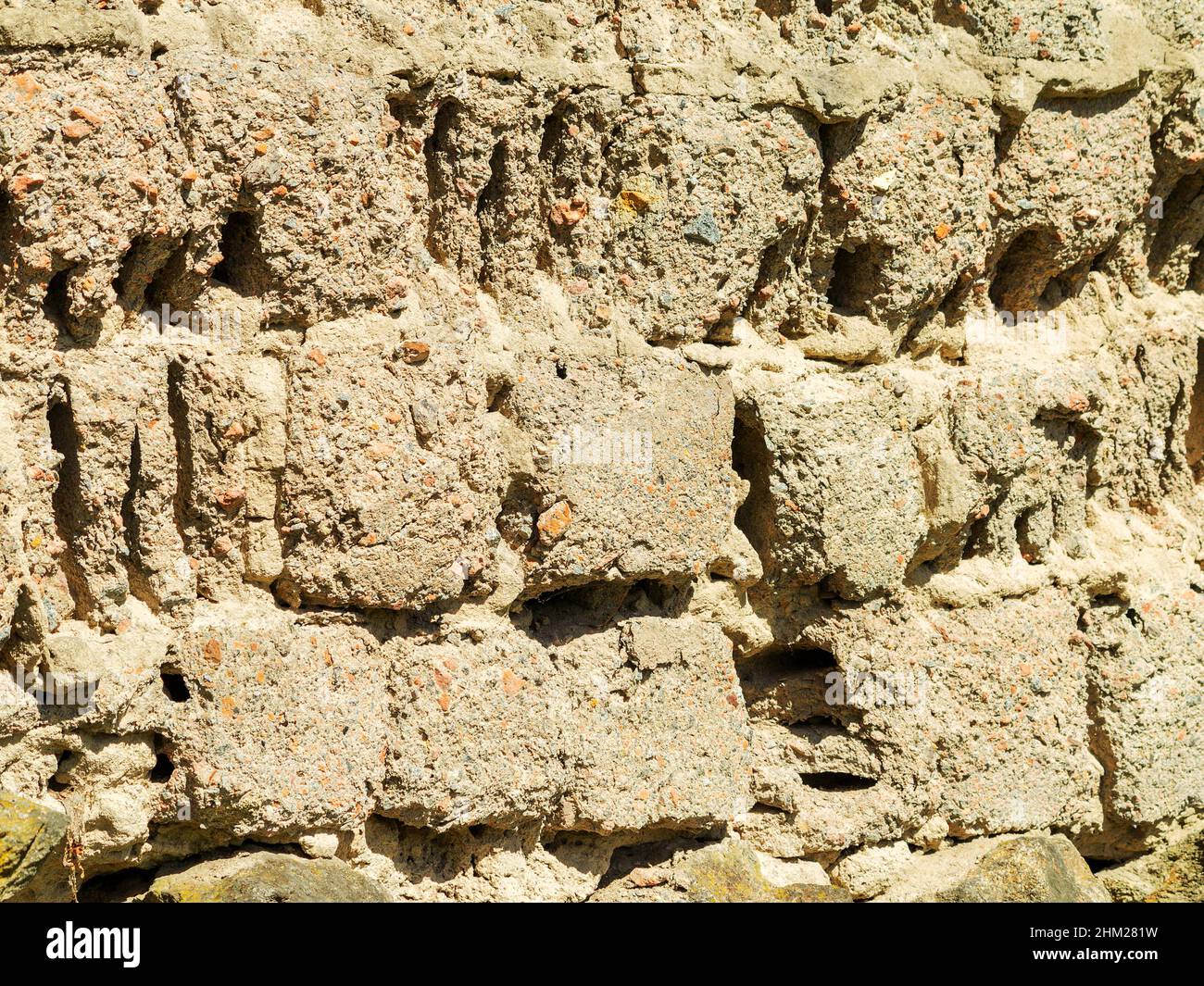 Abstract background of the old wall of black natural stone with cracks ...