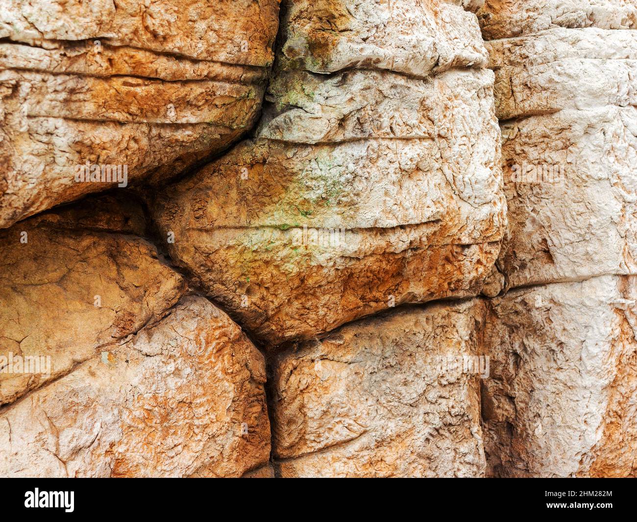 Abstract background of the old wall of black natural stone with cracks ...