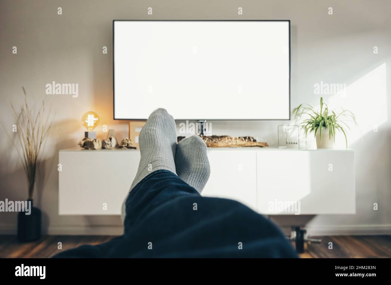 Man Watching TV in his living room, point of view perspective Stock ...
