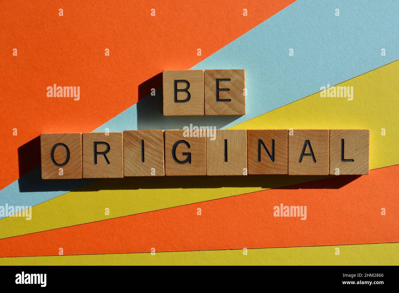 Be Original, words in wooden alphabet letters isolated on colourful ...