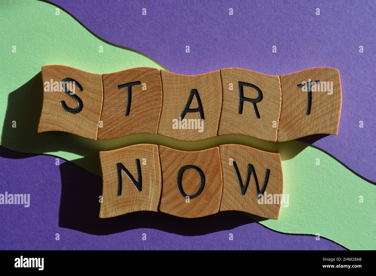Start Now, words in wooden alphabet letters isolated on background ...