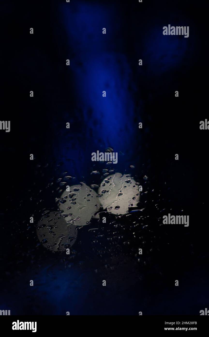 Abstract dark blue background with bright blue patches of color and ...