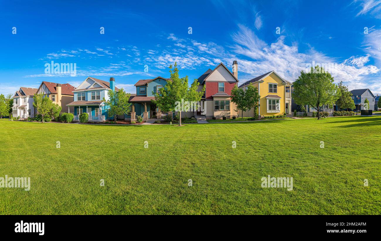 Facade of colorful traditional two-storey houses at Daybreak, Utah ...