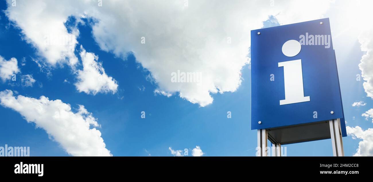Information sign with clouds background Stock Photo - Alamy